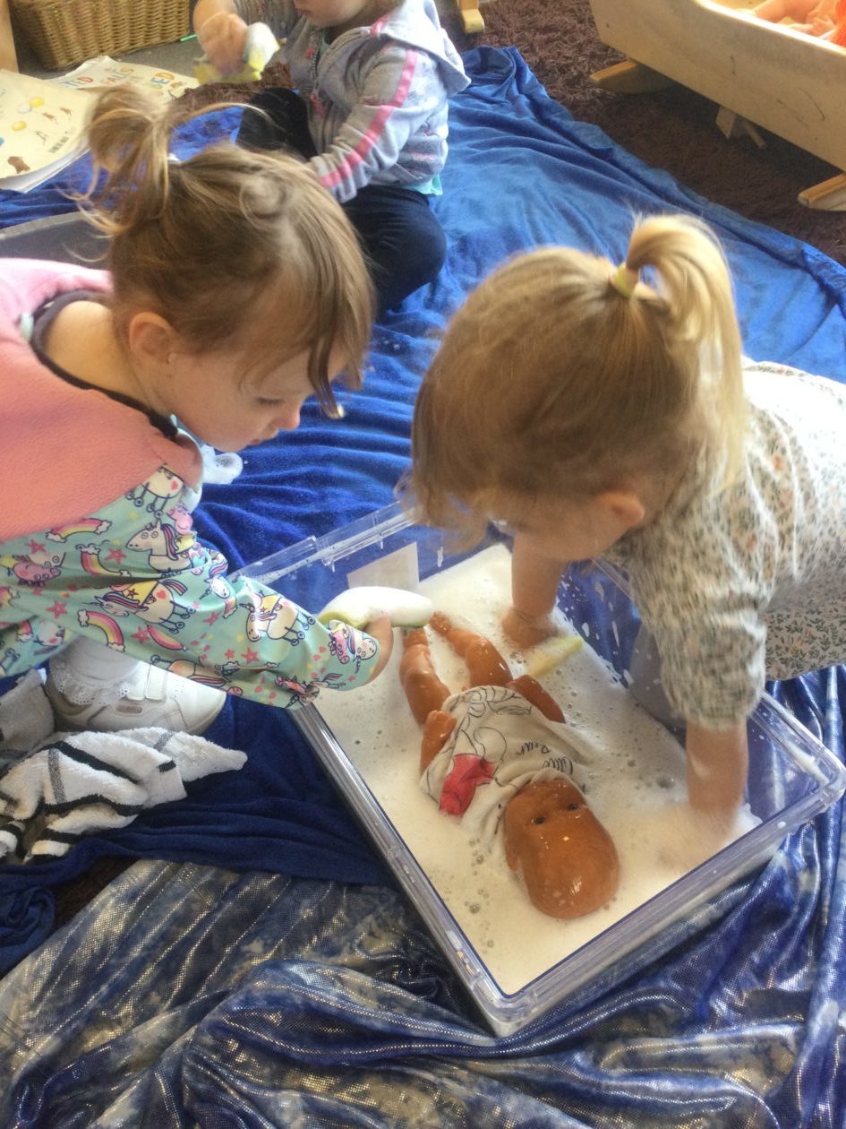 Bubbly fun washing our babies! | Cart Mill Family Centre