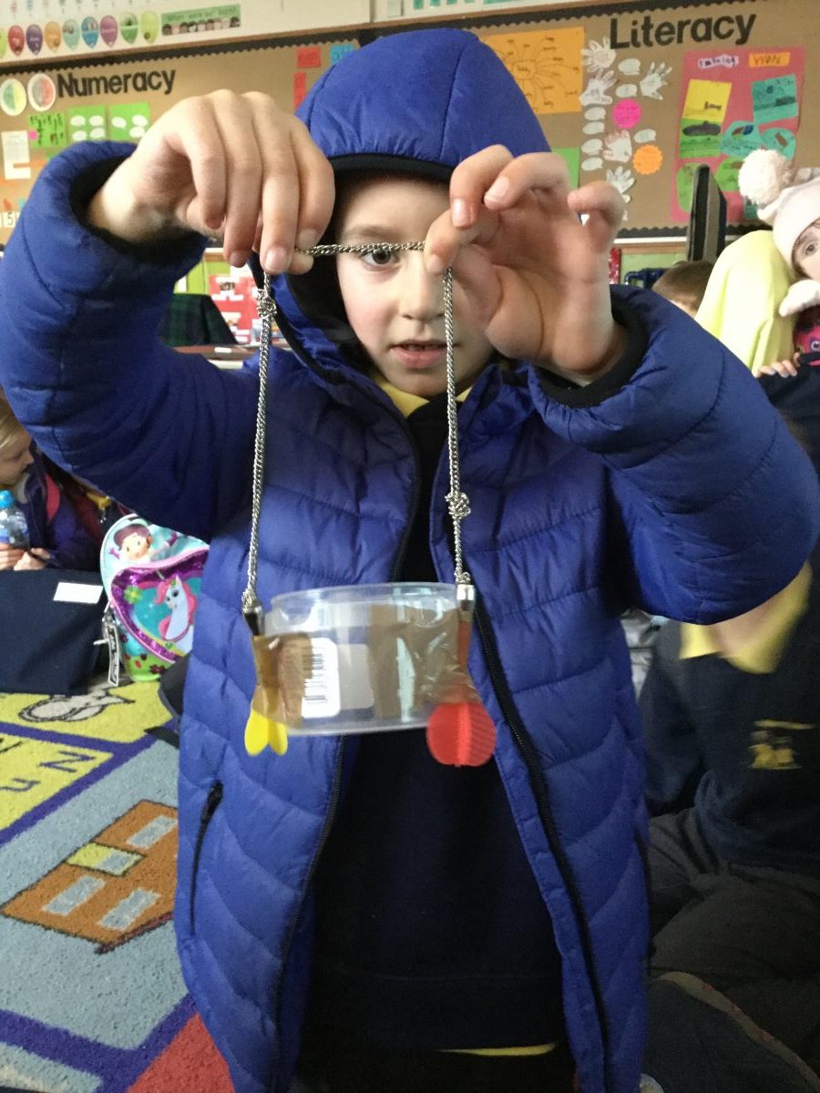 Learning about forces (push and pulls) while exploring magnets.