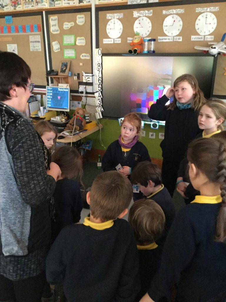 UNA learning about Bunono School in Uganda